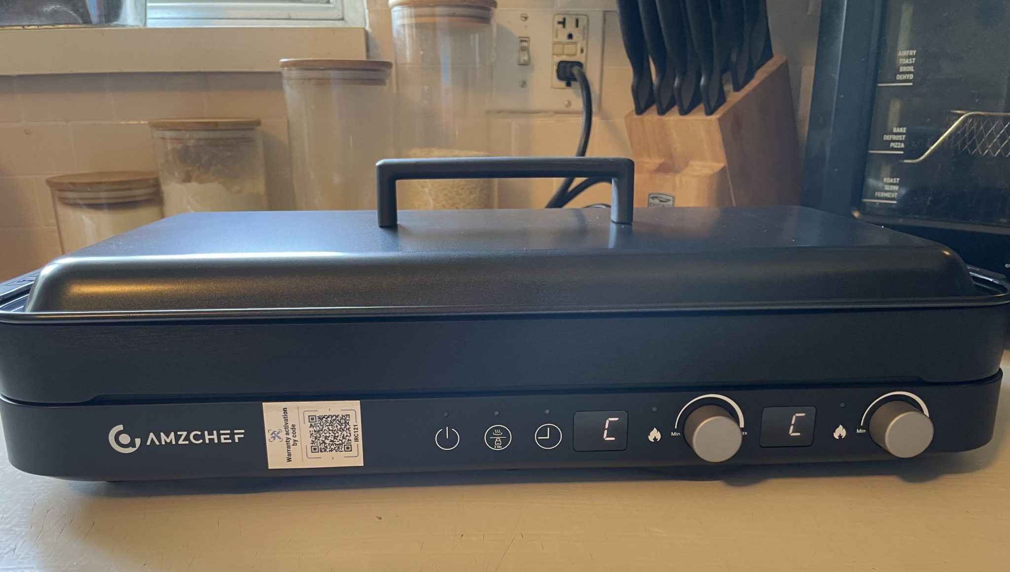 This AMZCHEF Double Induction Cooktop with Removable Griddle Pan ...