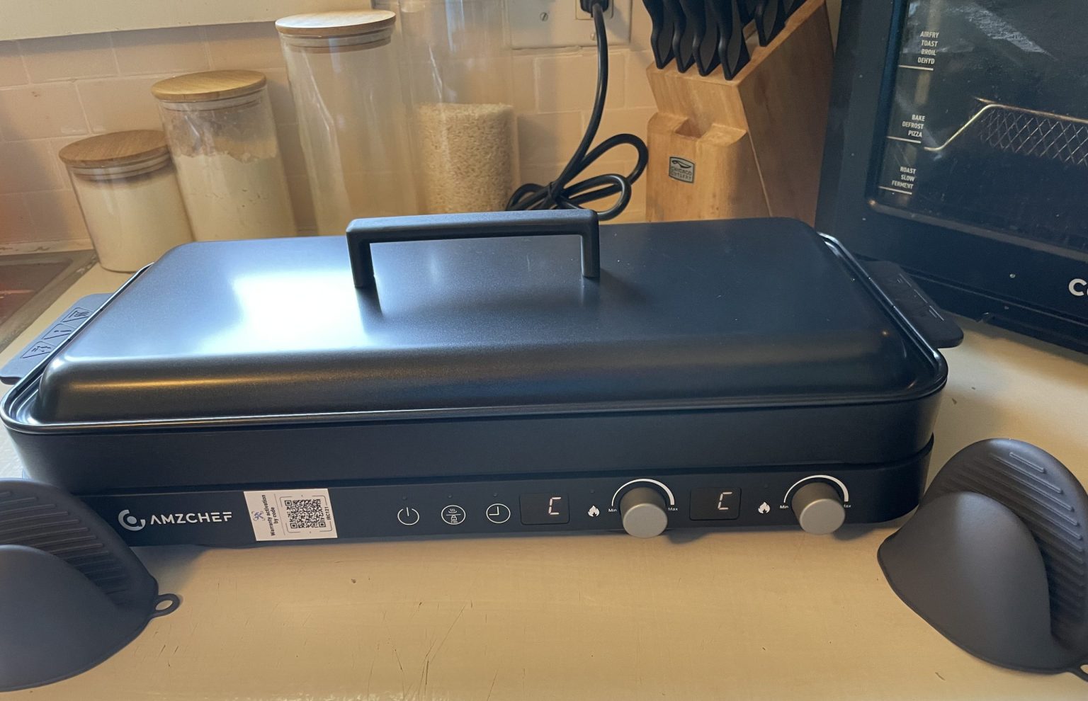 This AMZCHEF Double Induction Cooktop with Removable Griddle Pan ...